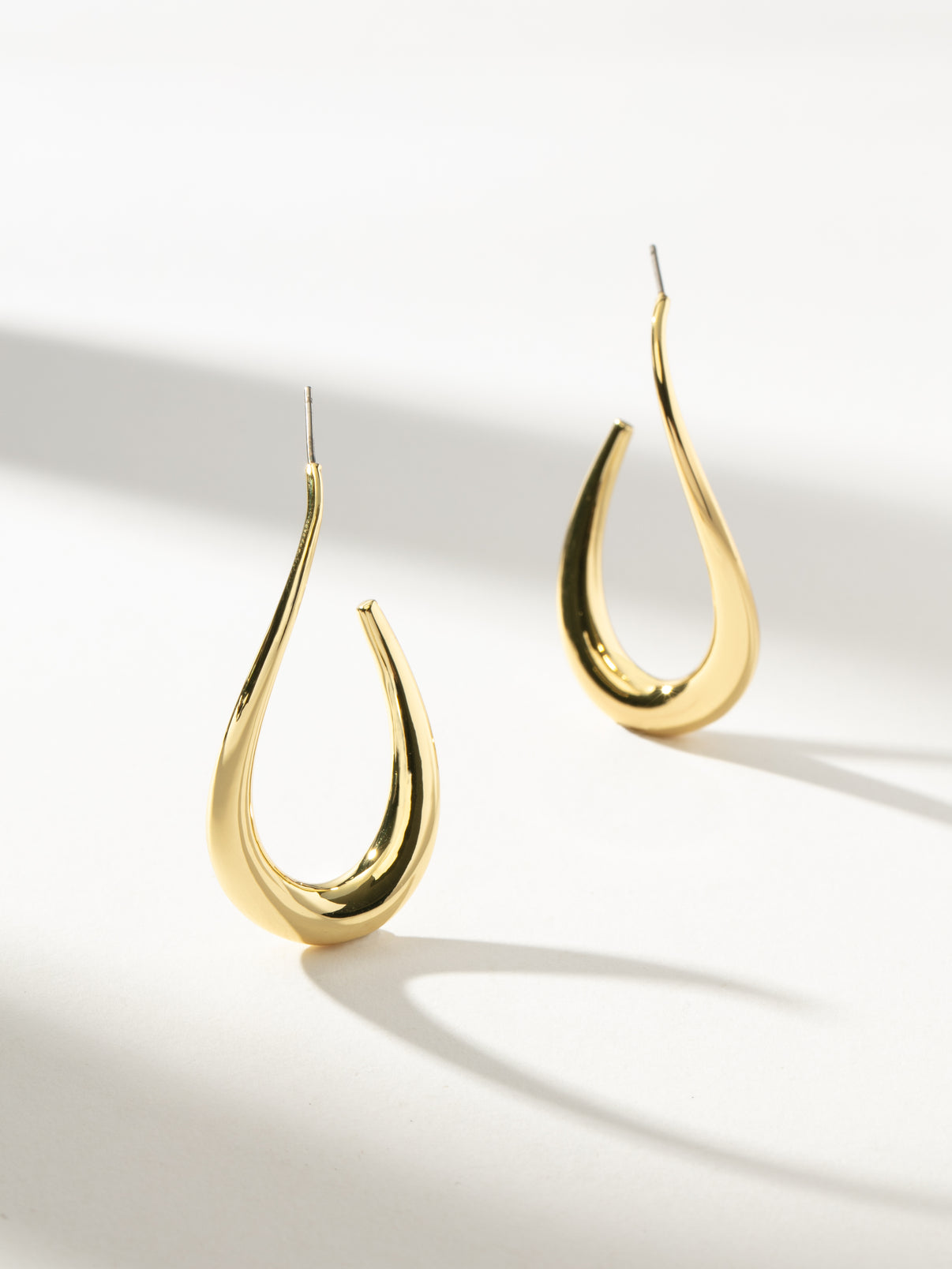 Plot Twist Statement Earrings in Gold | Uncommon James